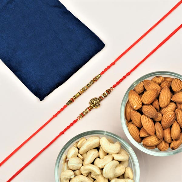 Send Raja Rani Rakhi Set with Dry Fruits Online