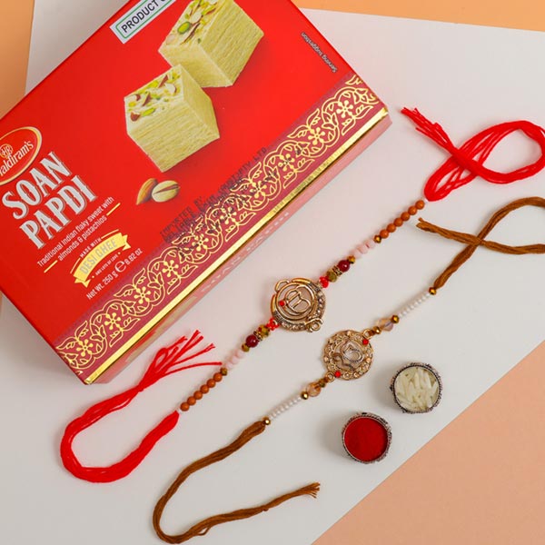 Send Two Punjabi Style Rakhi With Soan Papdi Online