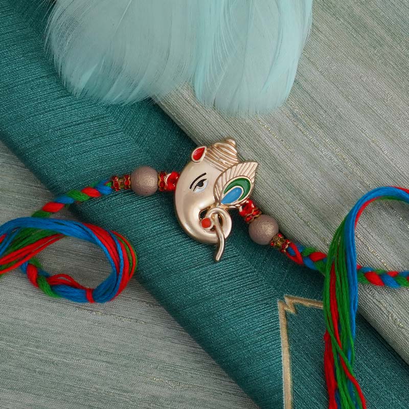 Send Golden Ganesha Rakhi Online