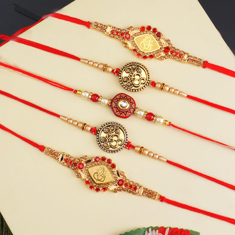 Send Designer Golden Rakhi Set for Brothers Online