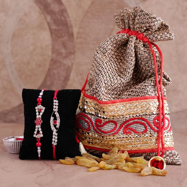Send Two AD Rakhi Set with Resins in Potli Online