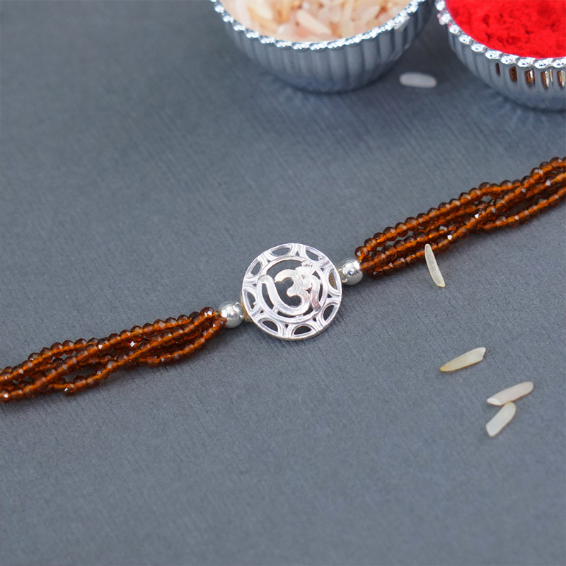 Send Om Sterling Silver Rakhi Online