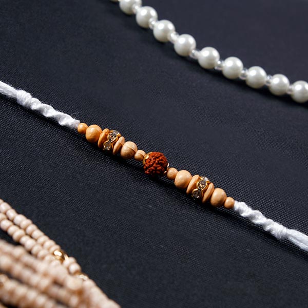 Send Sizzling White Fancy Rakhi Online